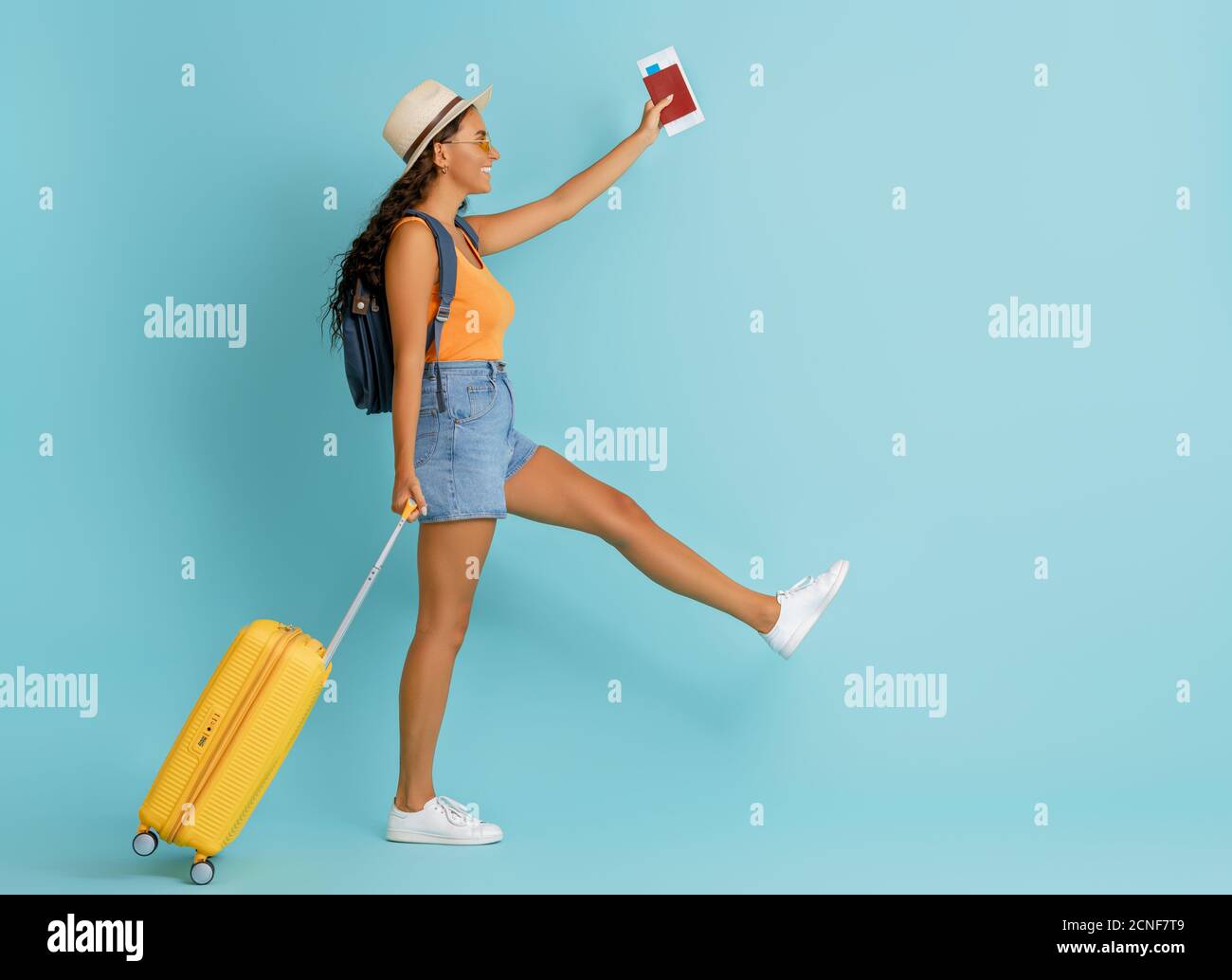 Go on an adventure! Happy woman going traveling. Young person with ...