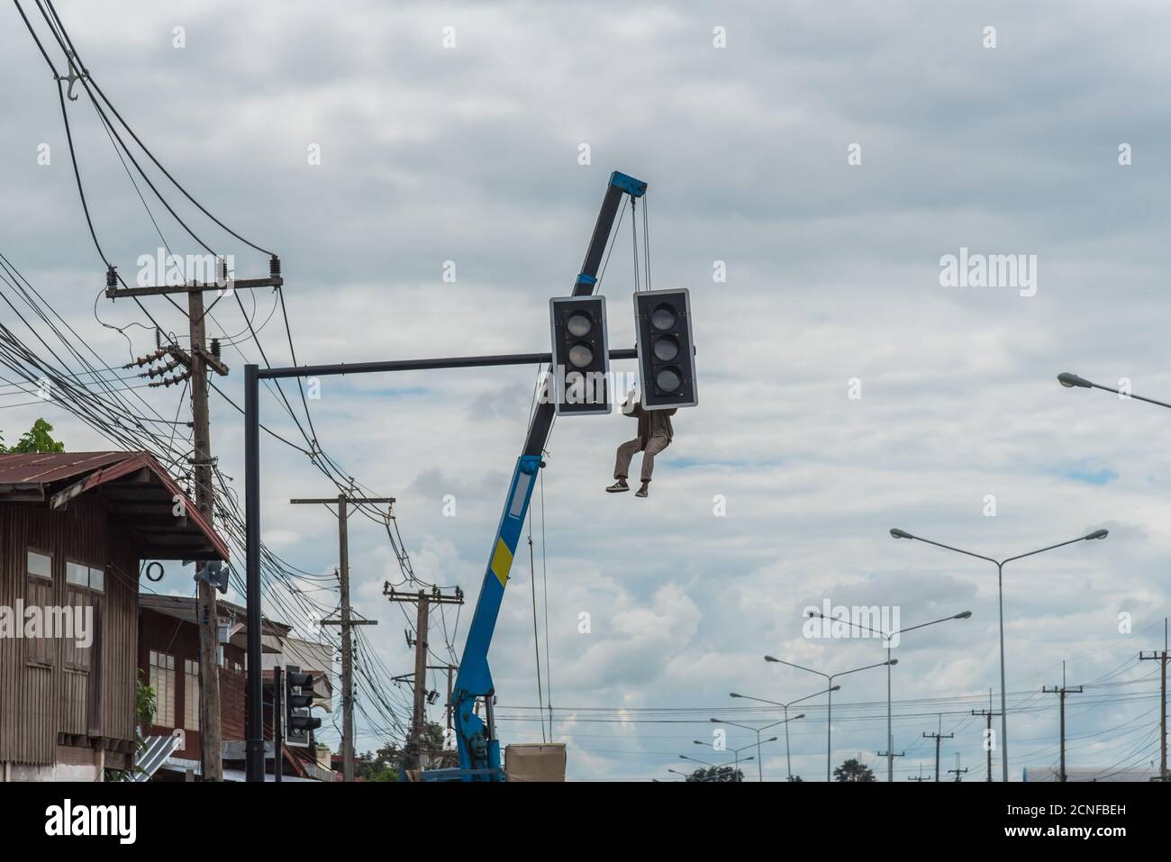 The repair team of electricians troubleshoots governing the traffic ...