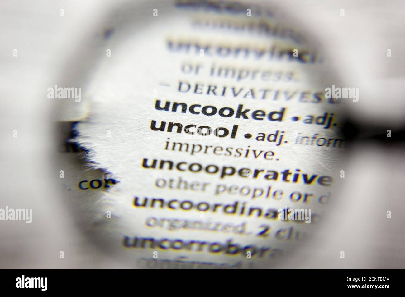 The word or phrase Uncool in a dictionary Stock Photo - Alamy