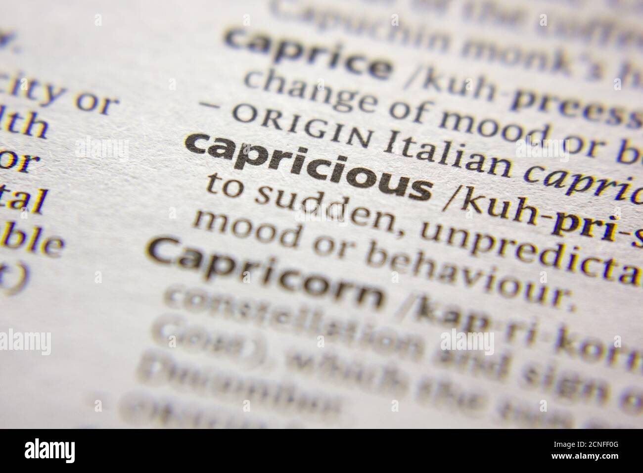 Word or phrase Capricious in a dictionary Stock Photo - Alamy