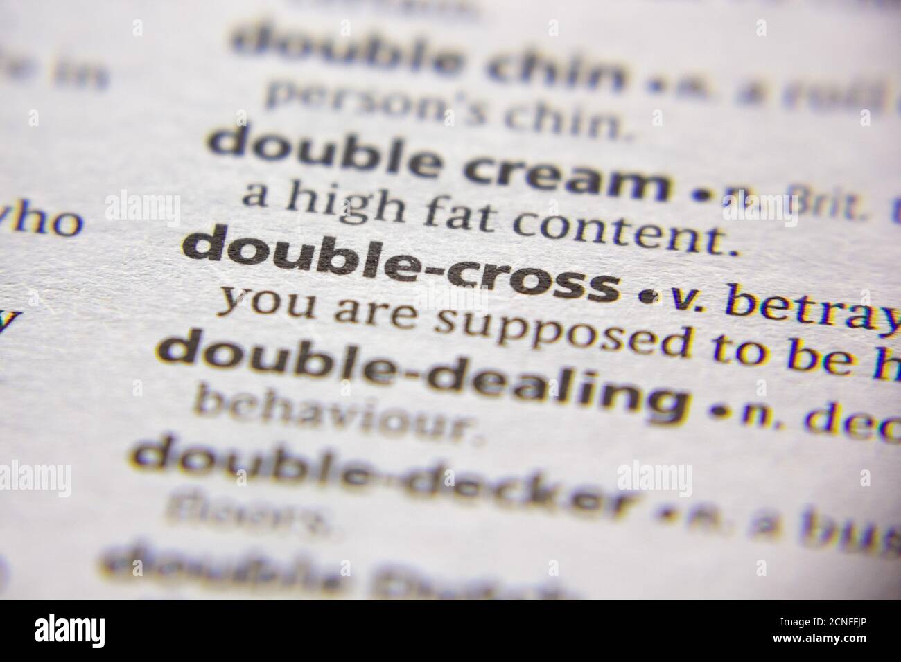 Word or phrase Double-cross in a dictionary Stock Photo - Alamy