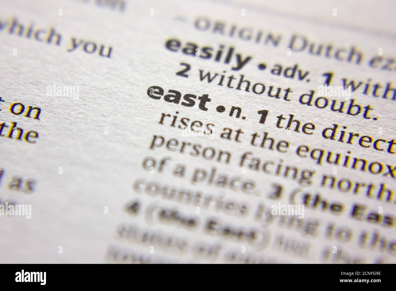 Word or phrase East in a dictionary Stock Photo - Alamy