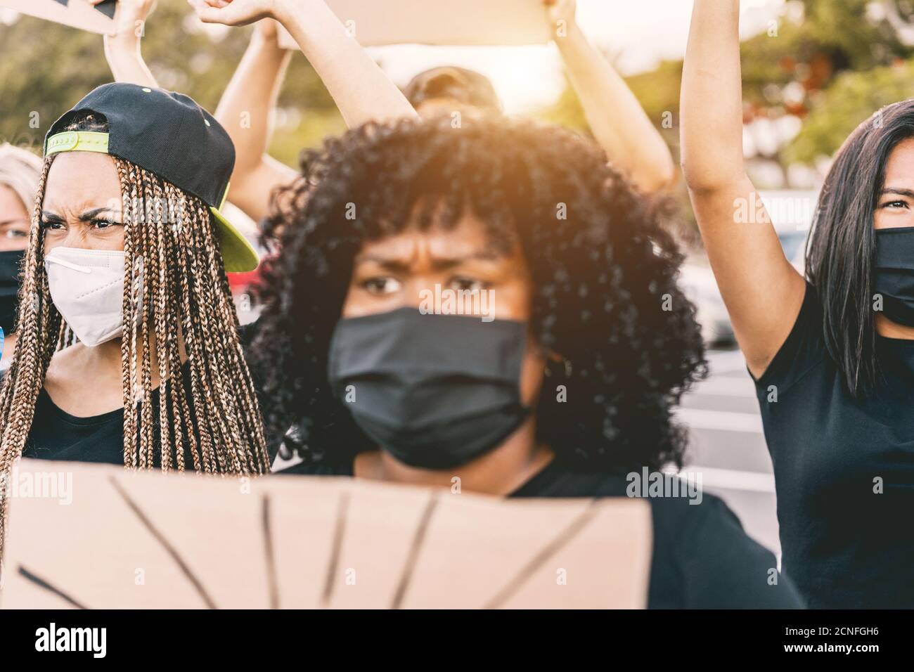 Multiracial people protest on the street for equal rights - Focus on ...