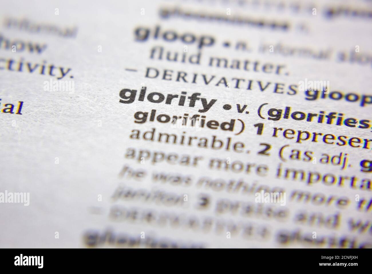 Word or phrase Glorify in a dictionary Stock Photo - Alamy