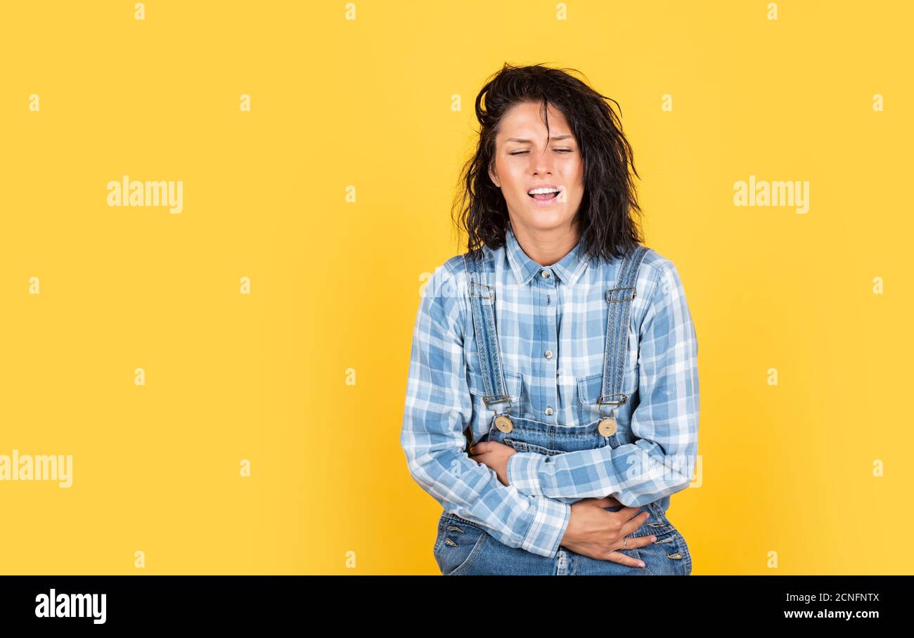 contractions and spasm. girl feeling pain in stomach. young woman ...