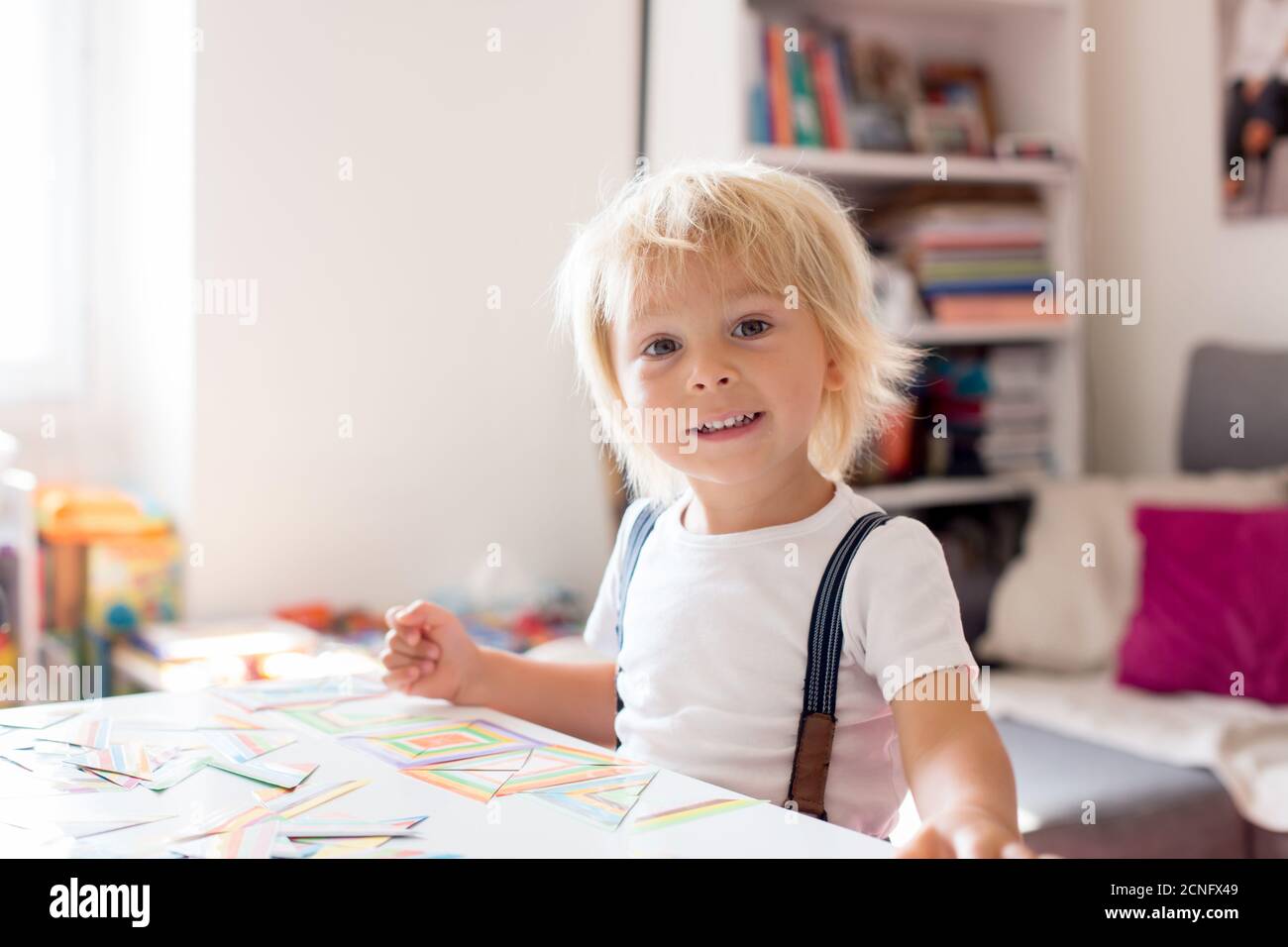 Child toddler boy playing developing games, learning alphabet and ...