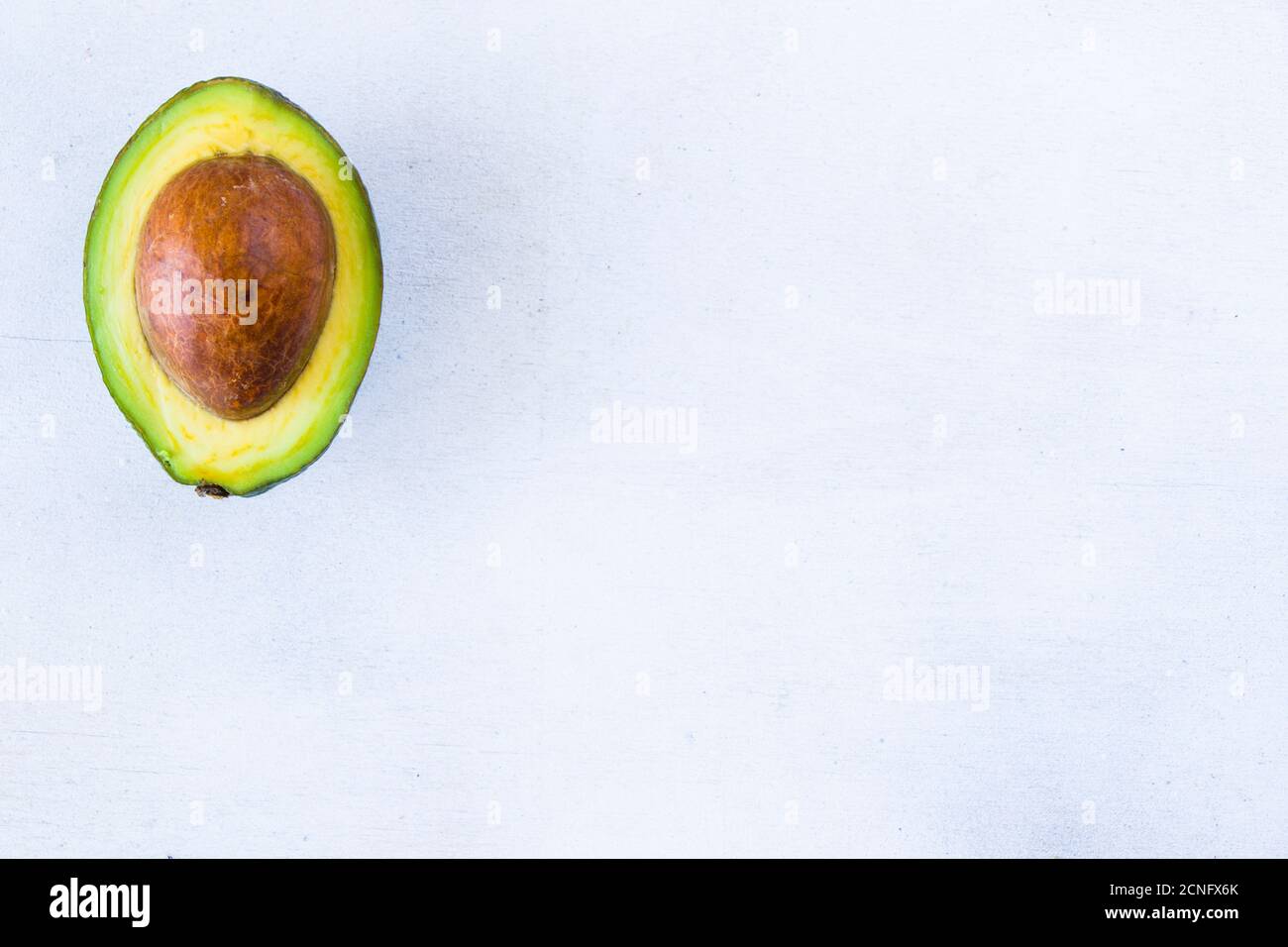 Top view single avocado hi-res stock photography and images - Alamy