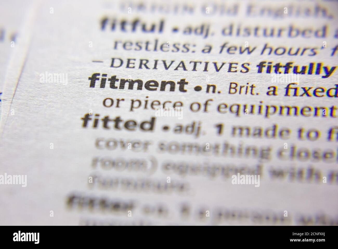 Word or phrase Fitment in a dictionary Stock Photo - Alamy