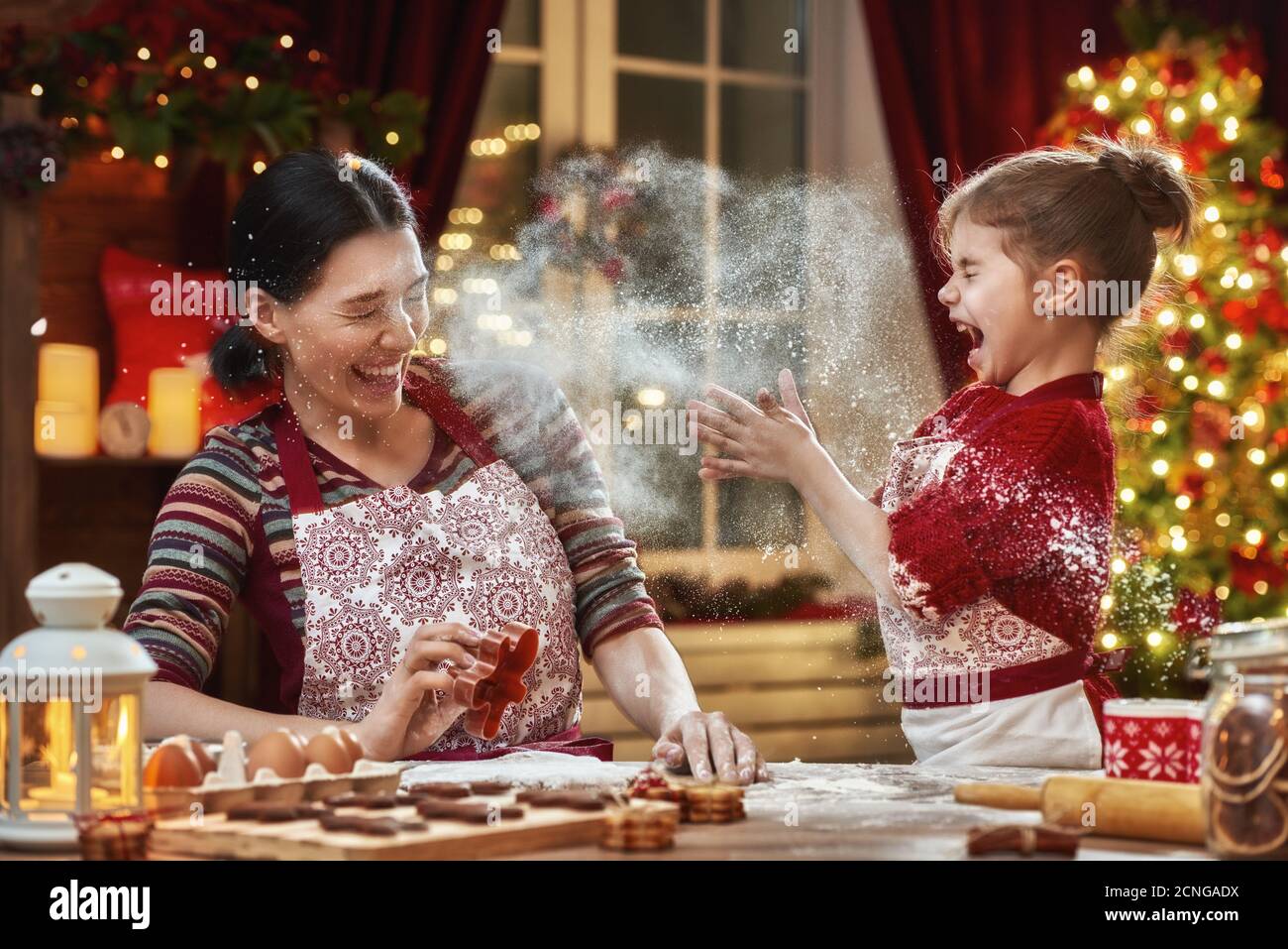 Merry Christmas and Happy Holidays. Family preparation holiday food ...