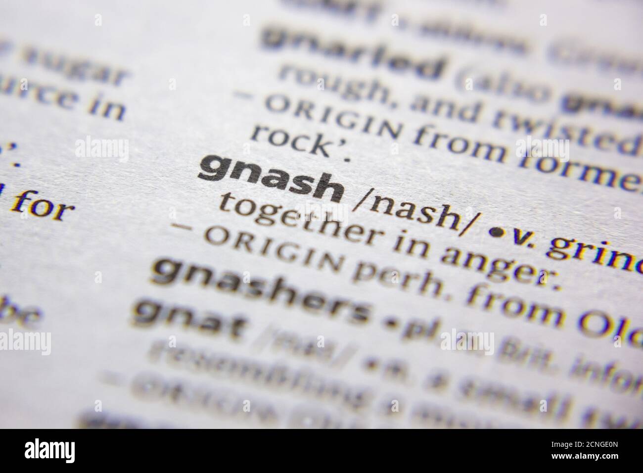 Word or phrase Gnash in a dictionary Stock Photo - Alamy