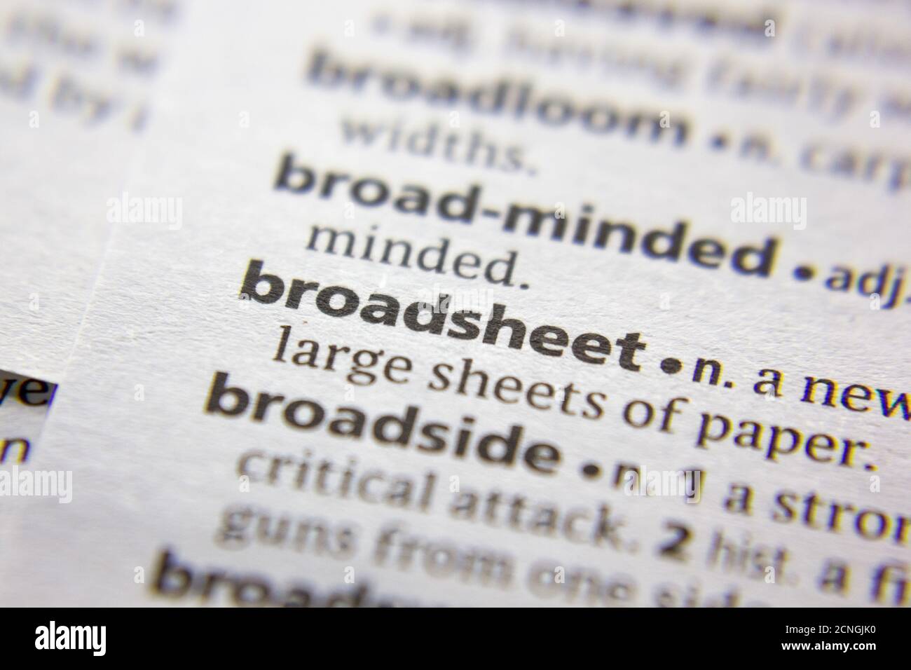 Broadsheet magnifying glass hi-res stock photography and images - Alamy