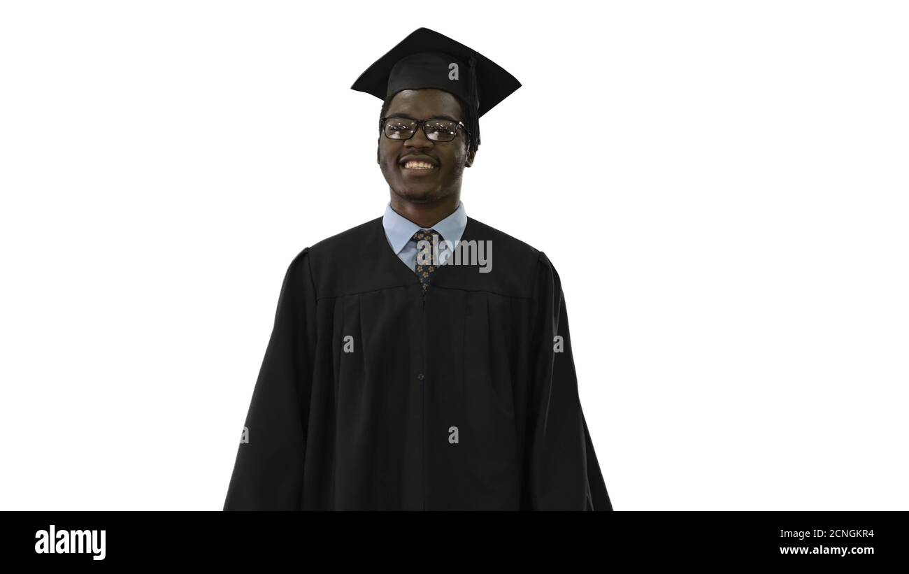 Happy African American Male Student in graduation robe walking o Stock ...