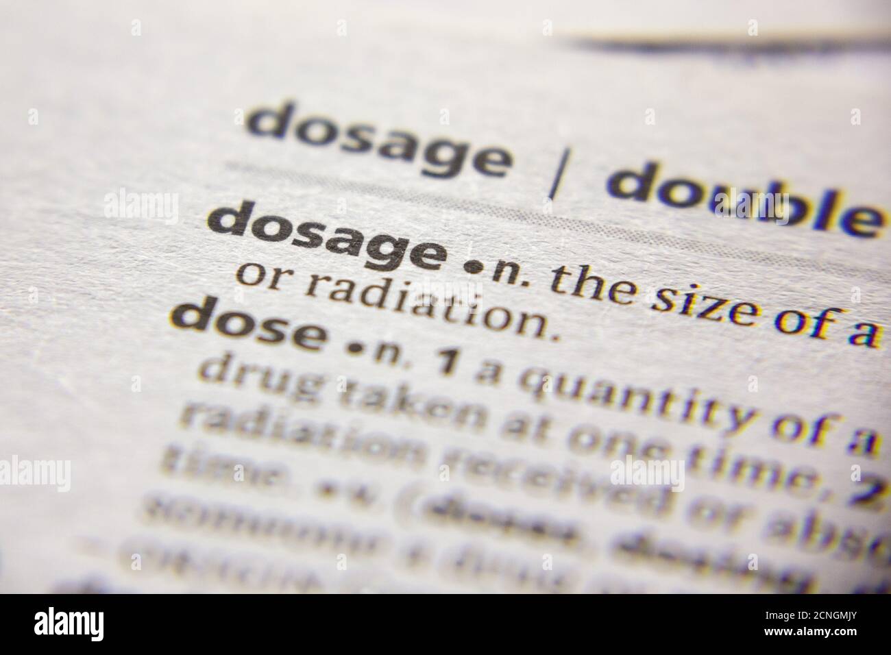 Word or phrase Dosage in a dictionary Stock Photo - Alamy