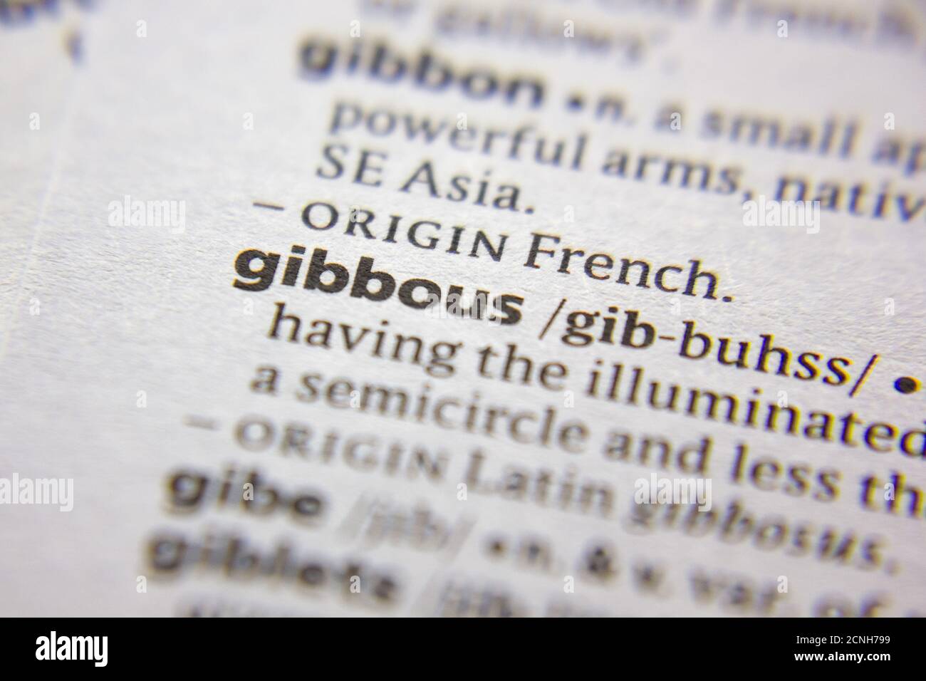 Word or phrase Gibbous in a dictionary Stock Photo - Alamy