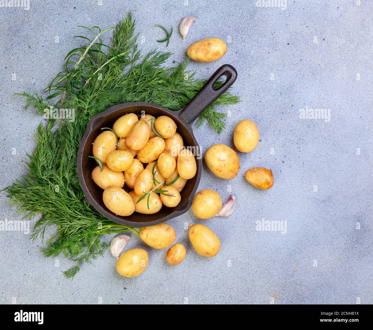 Whole young potatoes for baking Stock Photo - Alamy