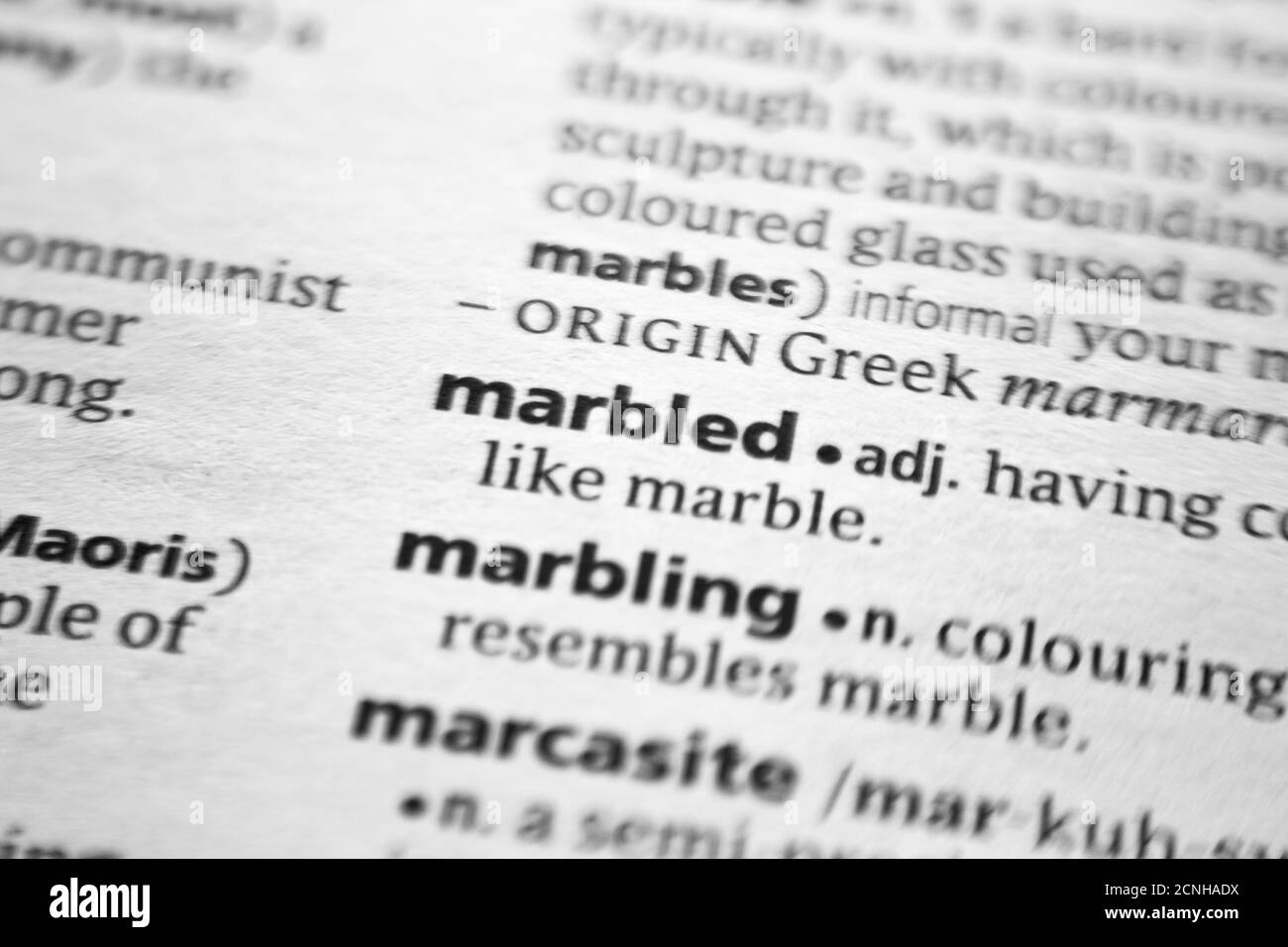 Word or phrase Marbled in a dictionary Stock Photo - Alamy