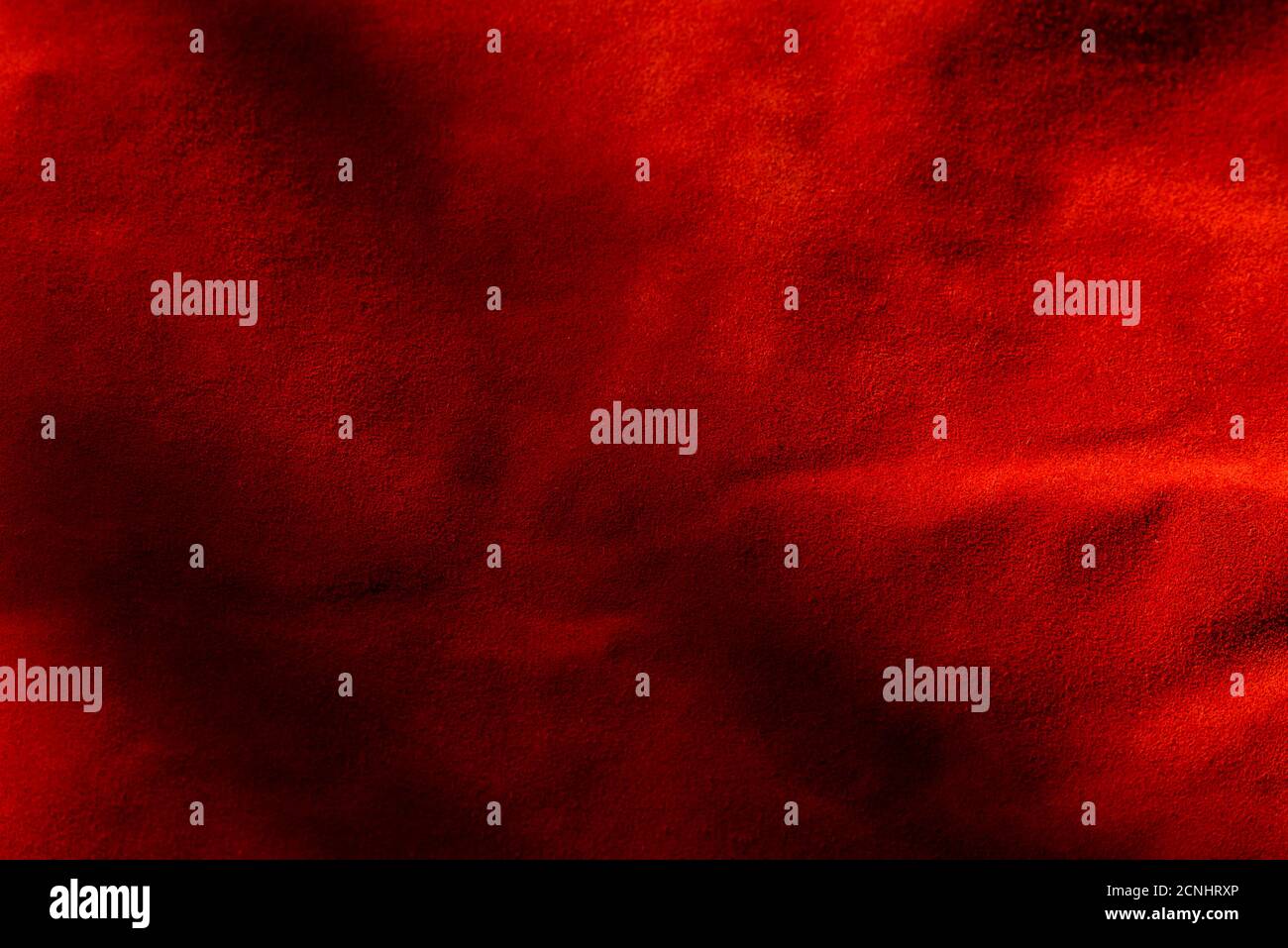 Dark red matte background of suede fabric, closeup. Velvet texture of ...