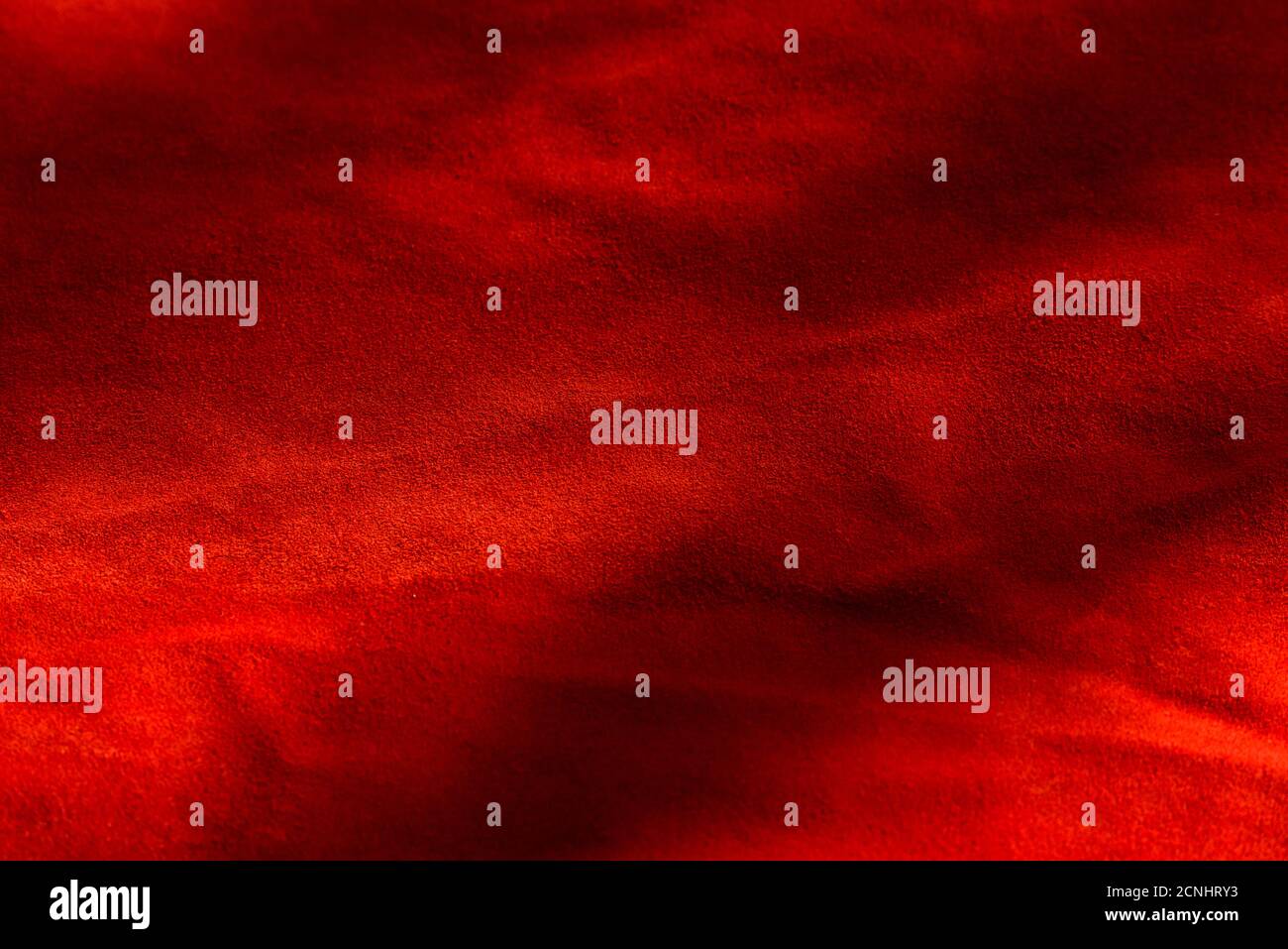 Dark red matte background of suede fabric, closeup. Velvet texture of ...