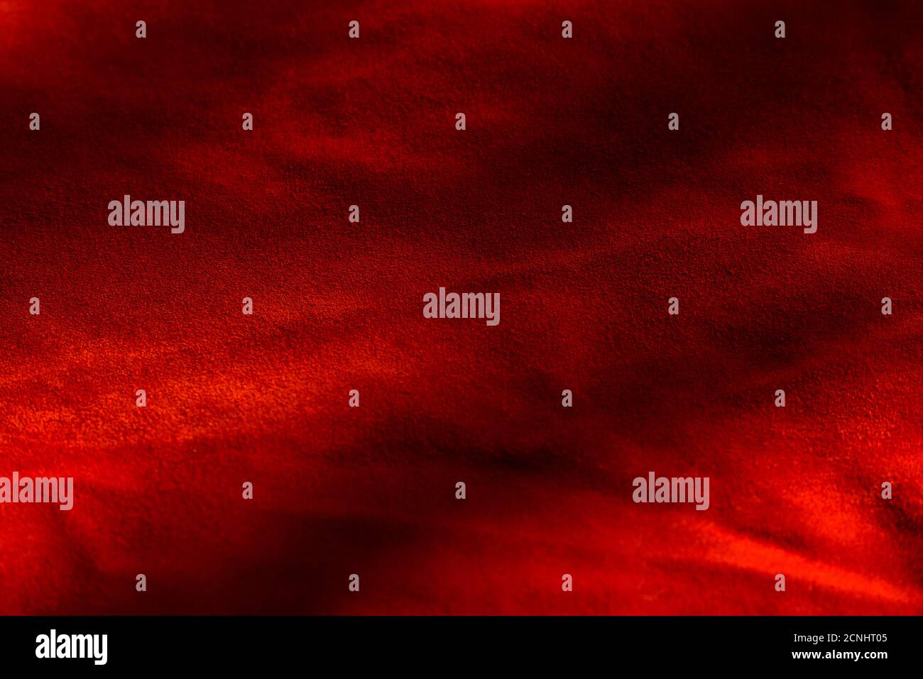 Dark red matte background of suede fabric, closeup. Velvet texture of ...