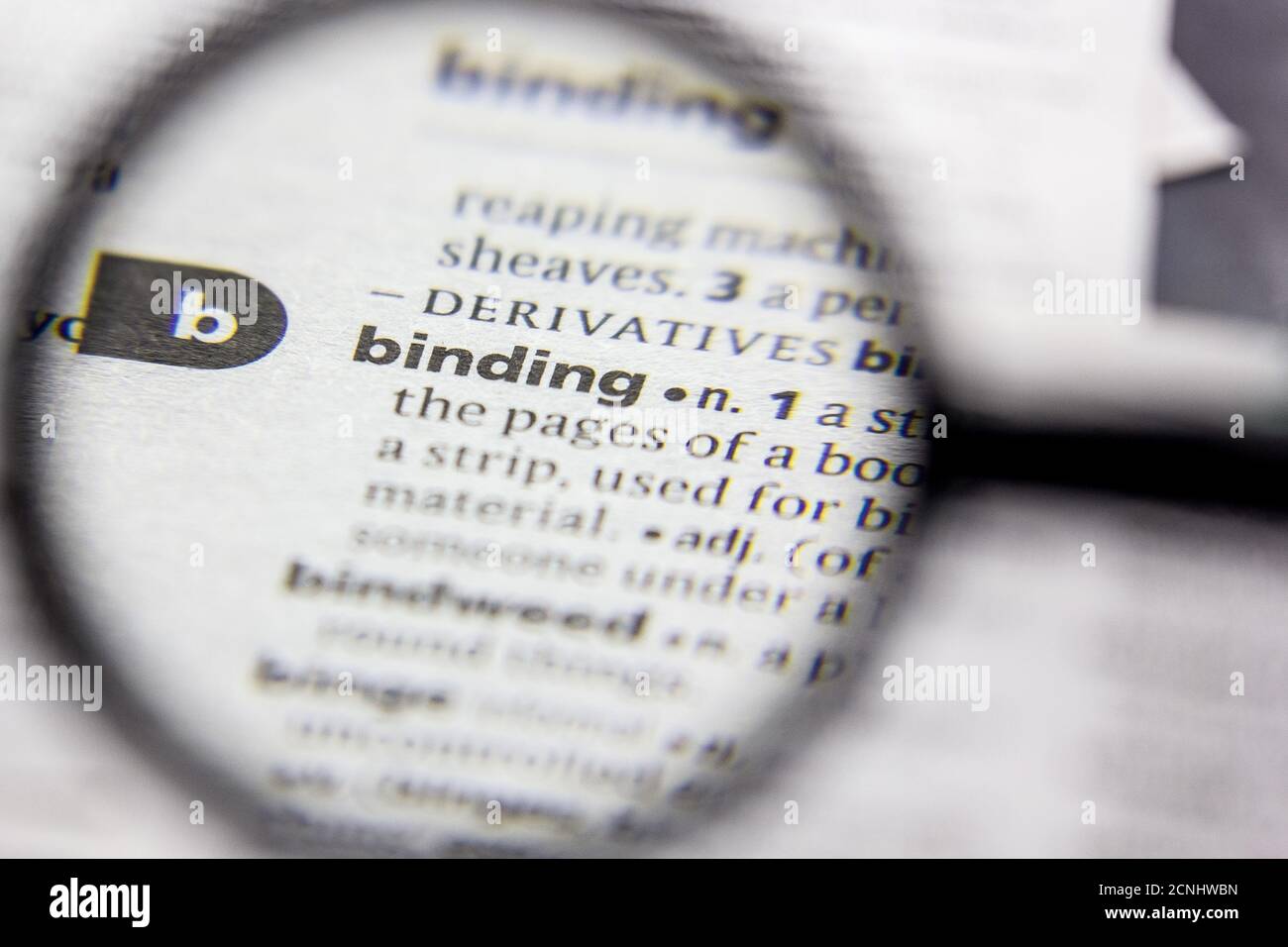 Word or phrase Binding in a dictionary Stock Photo - Alamy