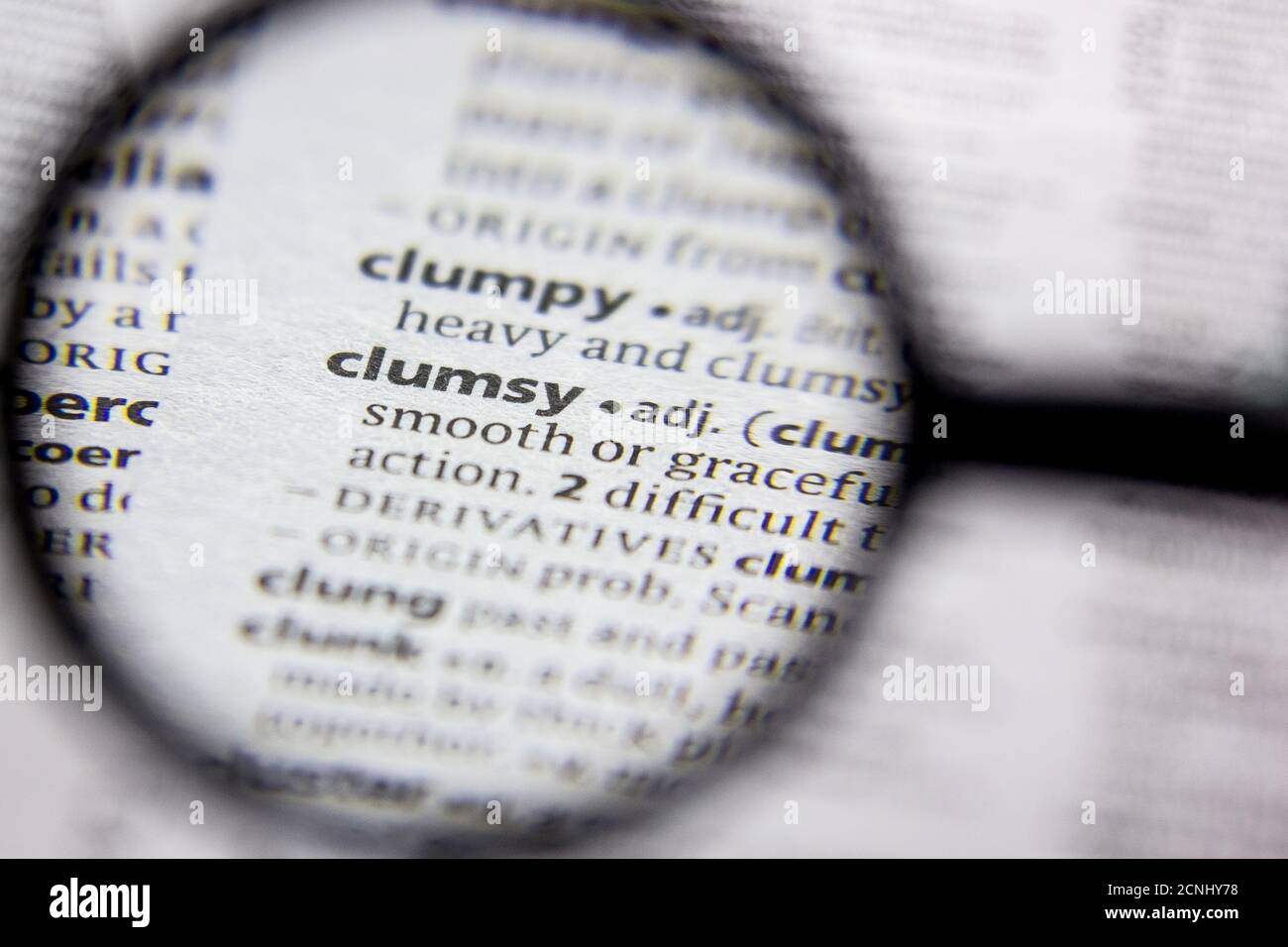 Word or phrase Clumsy in a dictionary Stock Photo - Alamy