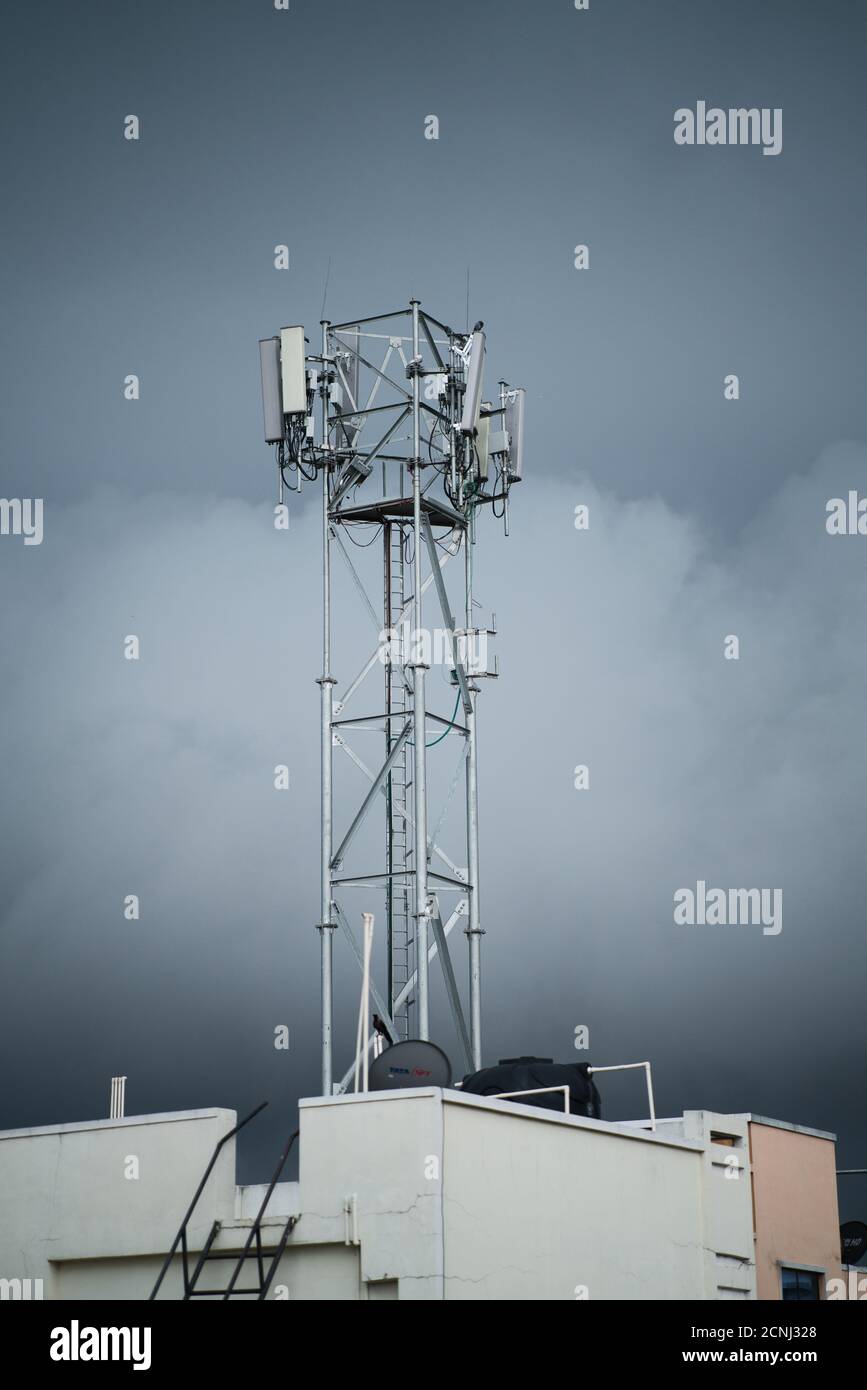 Multiple cell antennas on one building hi-res stock photography and images - Alamy