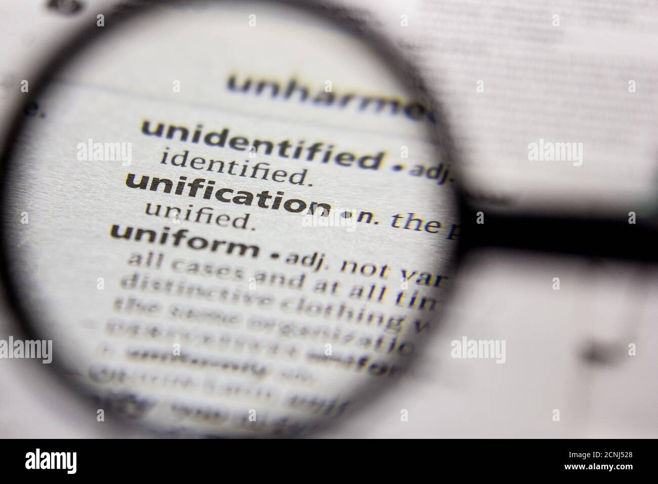 Word or phrase Unification in a dictionary Stock Photo - Alamy