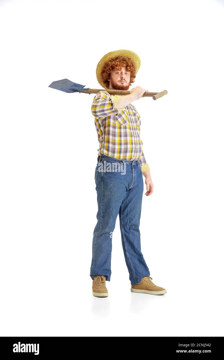 Handsome farmer, rancher isolated over white studio background. Concept ...