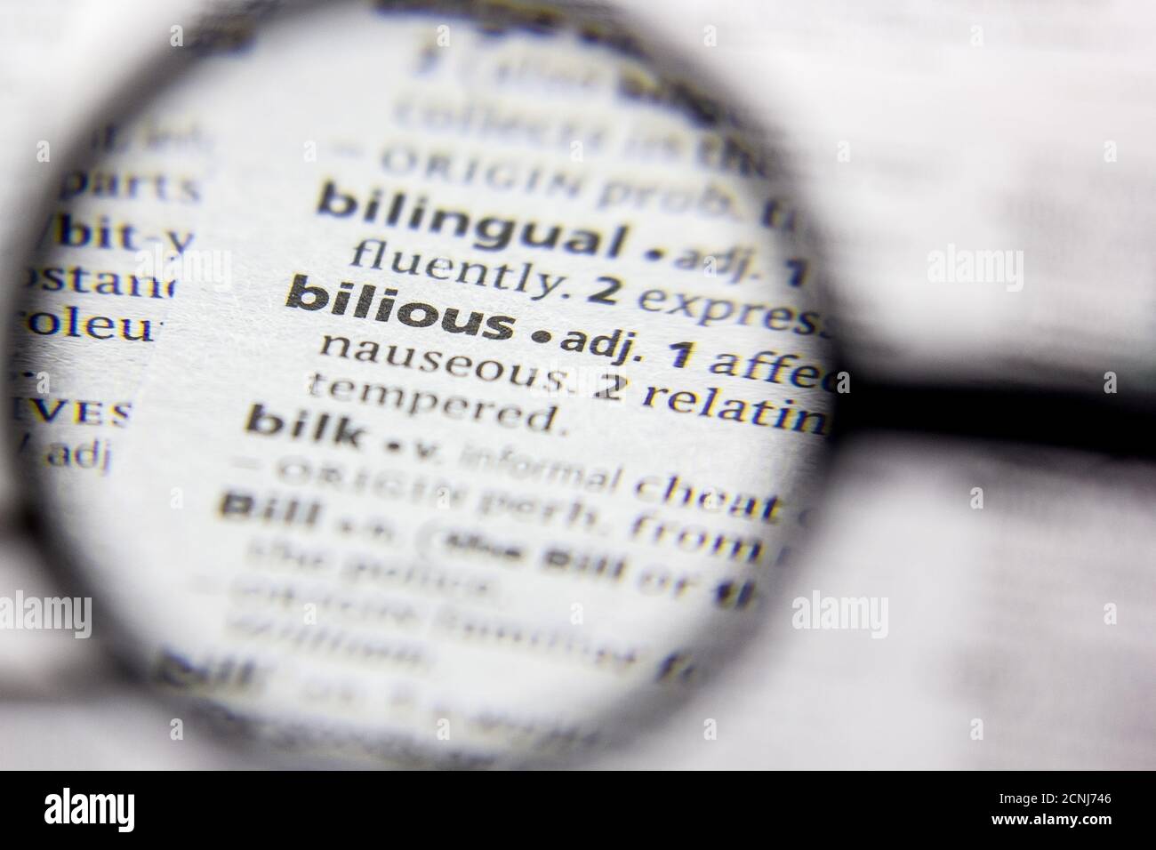 Word or phrase Bilious in a dictionary Stock Photo - Alamy