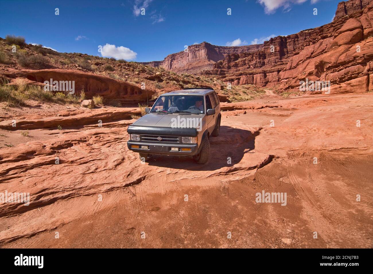Visitor, 4WD vehicle, on Potash Road in Shafer Canyon, near Colorado ...