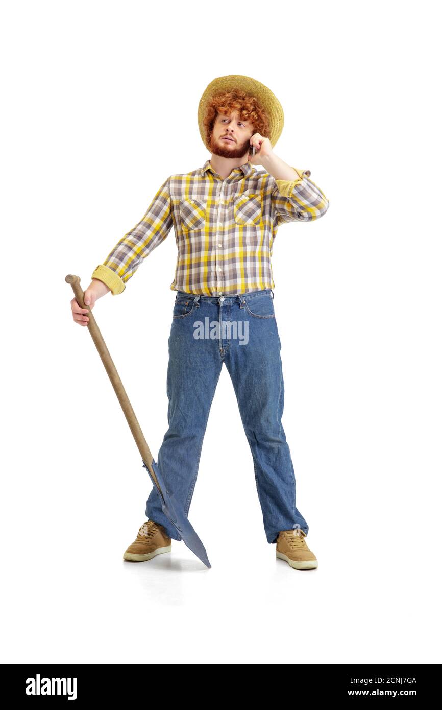 Handsome farmer, rancher isolated over white studio background. Concept ...