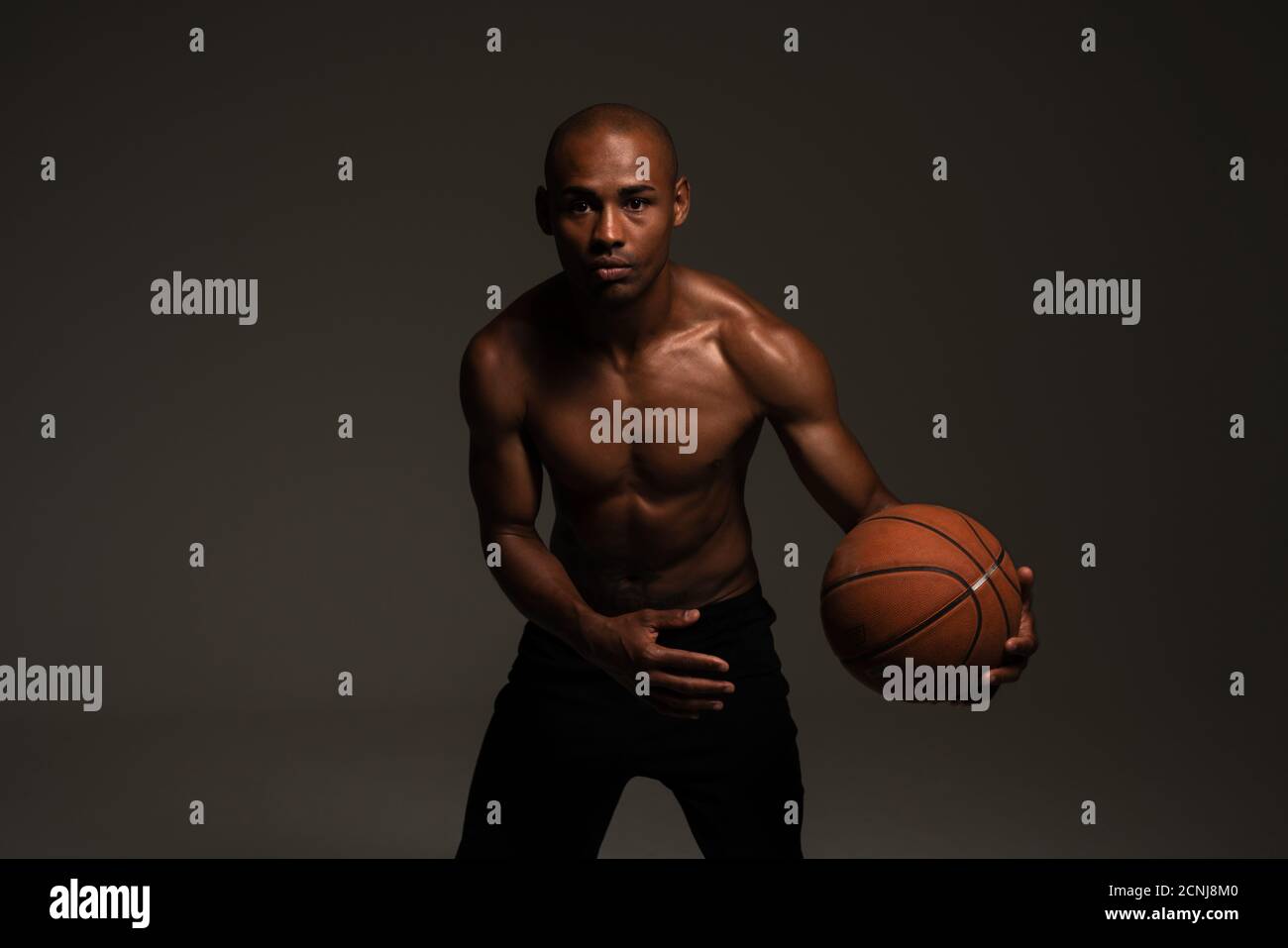 Photo of a handsome strong african fitness sports man isolated over ...