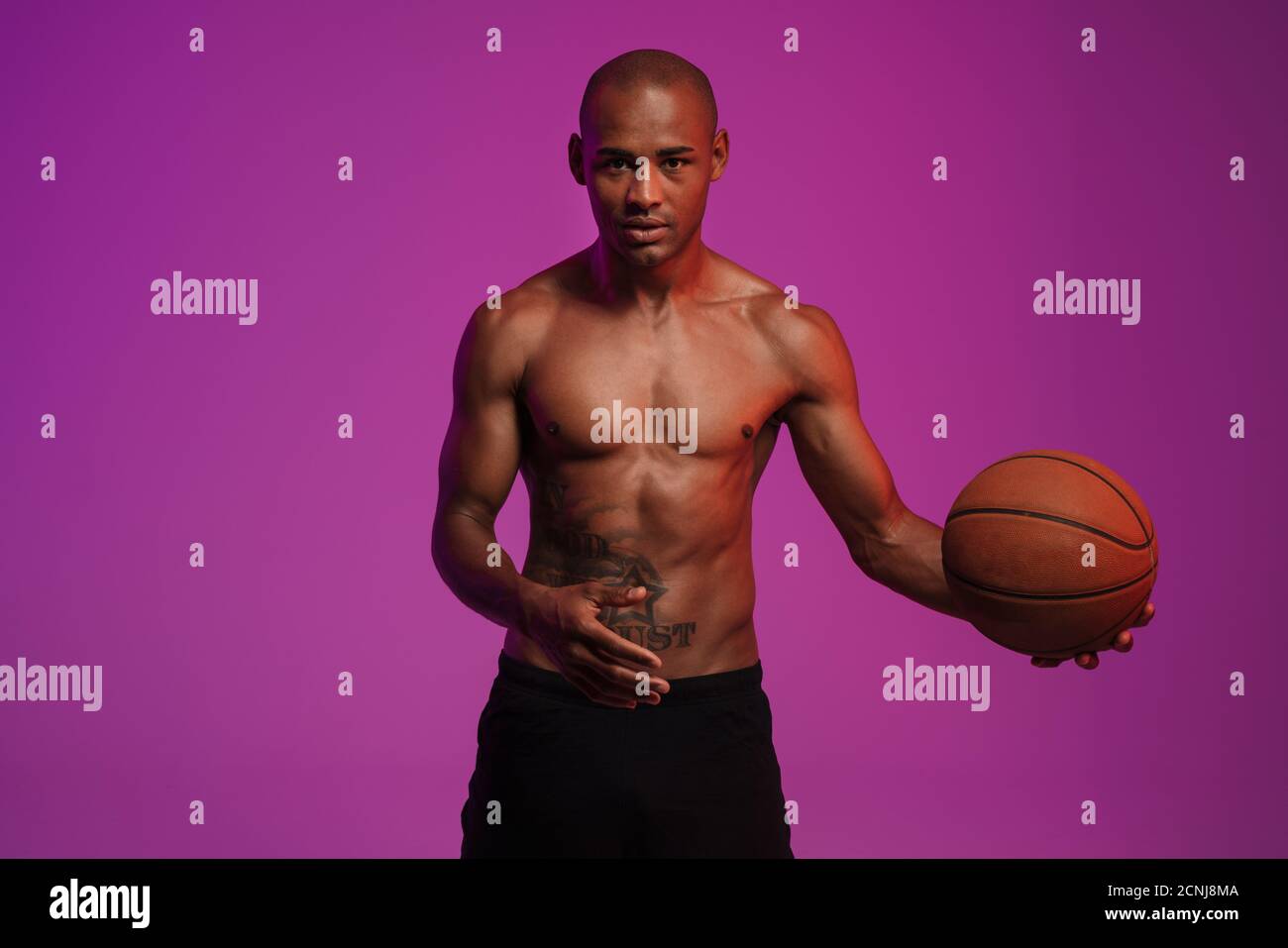 Image of a concentrated strong african fitness sports man isolated over ...