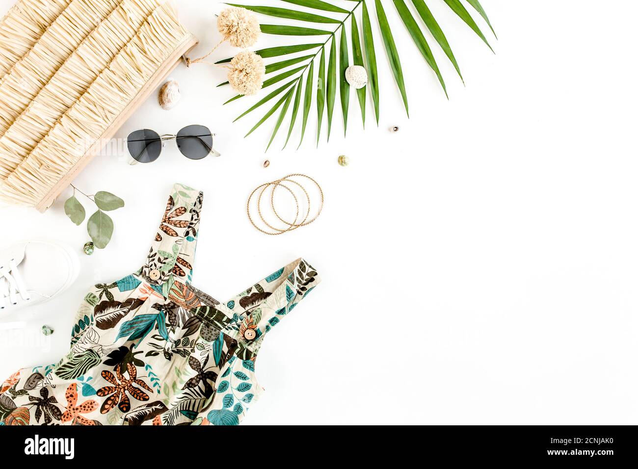 Female, summer street style. Sundress-dress, straw hat, sneakers ...