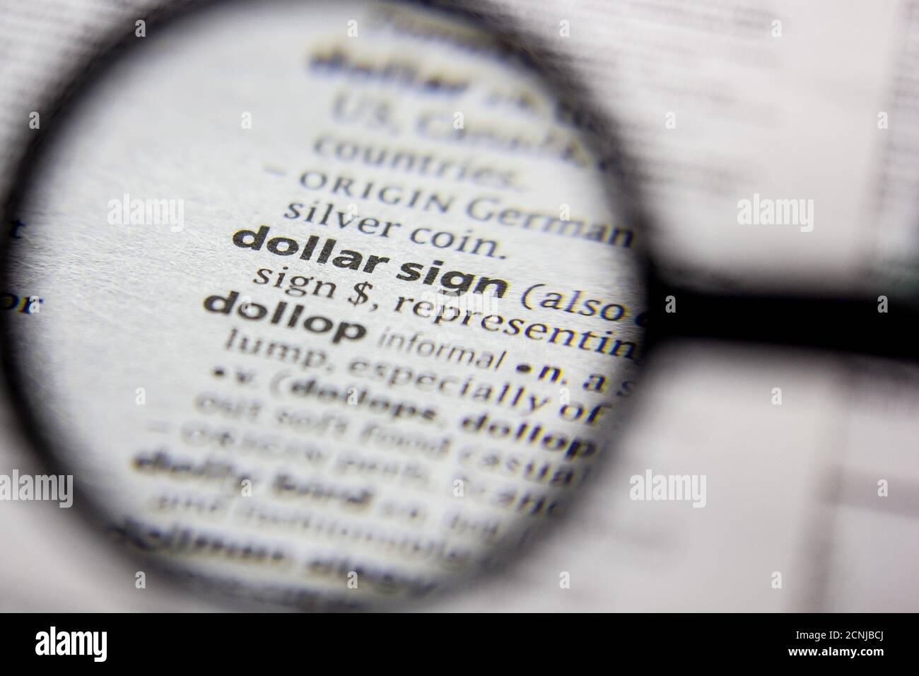 Word or phrase Dollar sign in a dictionary Stock Photo - Alamy