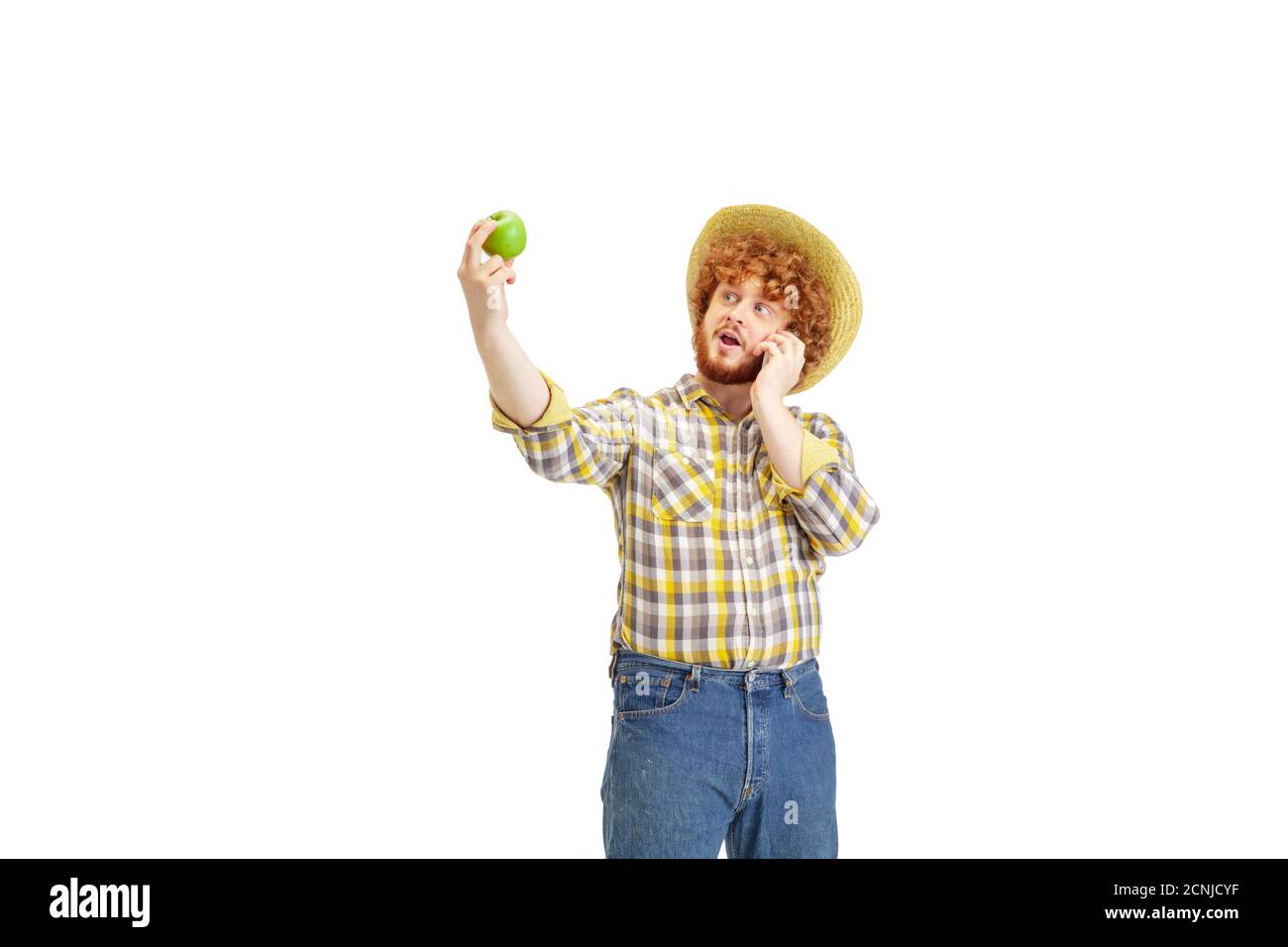 Handsome farmer, rancher isolated over white studio background. Concept ...