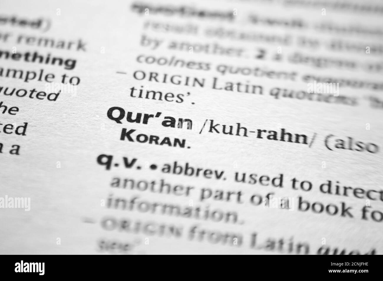 Word or phrase Qur'an in a dictionary Stock Photo - Alamy