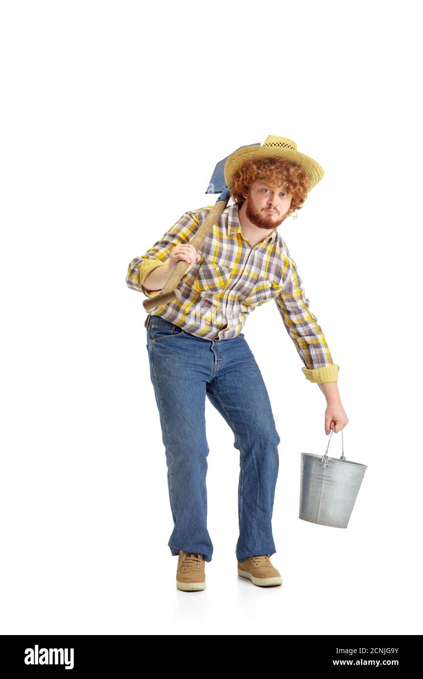 Handsome farmer, rancher isolated over white studio background. Concept ...