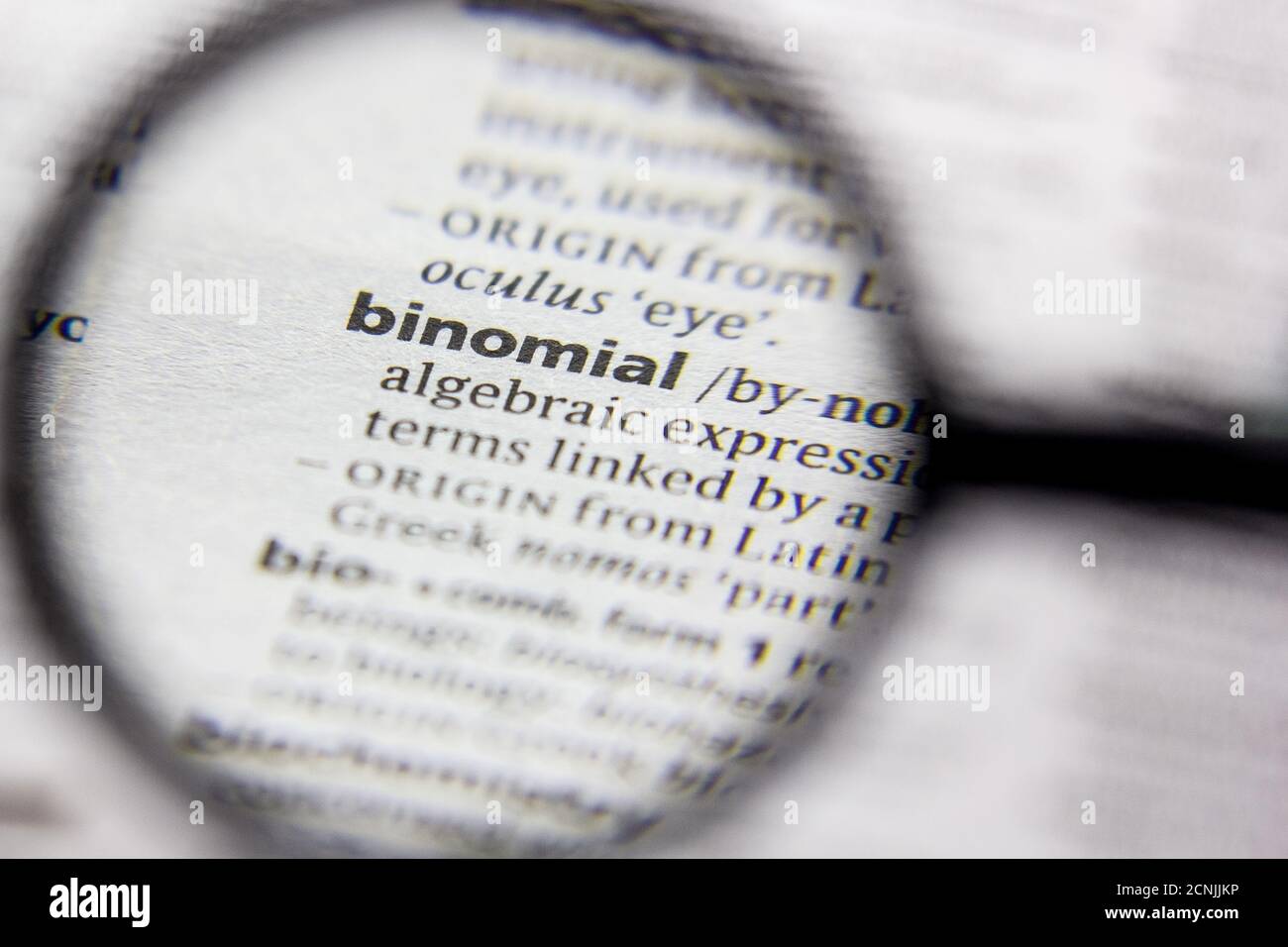 Word or phrase binomial in a dictionary Stock Photo - Alamy