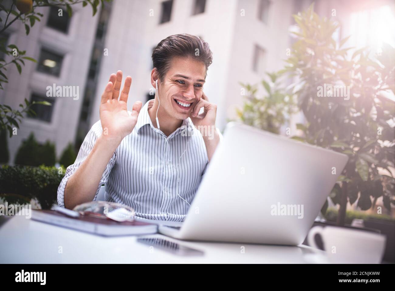 Positive programmer using smartphone hi-res stock photography and ...