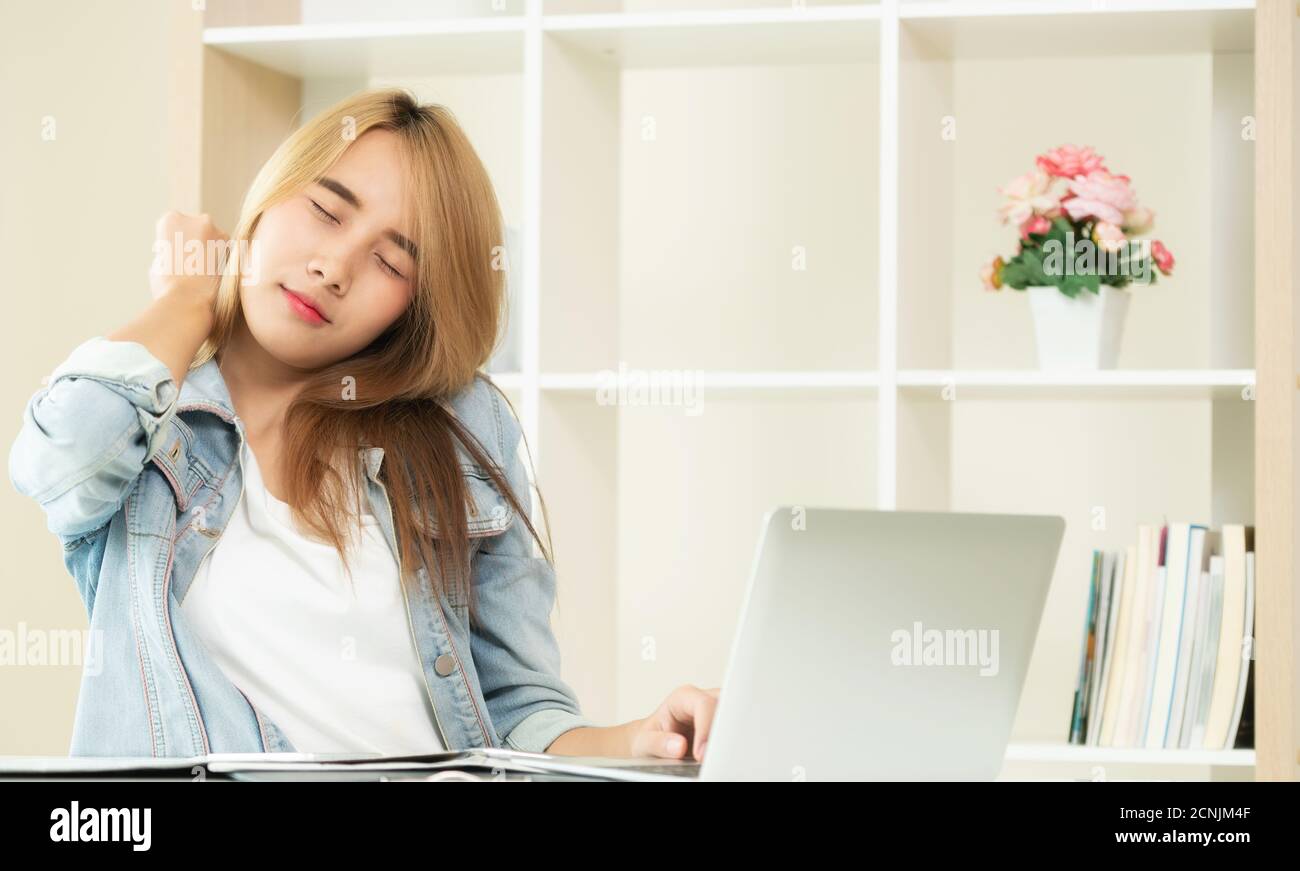 Woman with computer relieved hi-res stock photography and images - Alamy