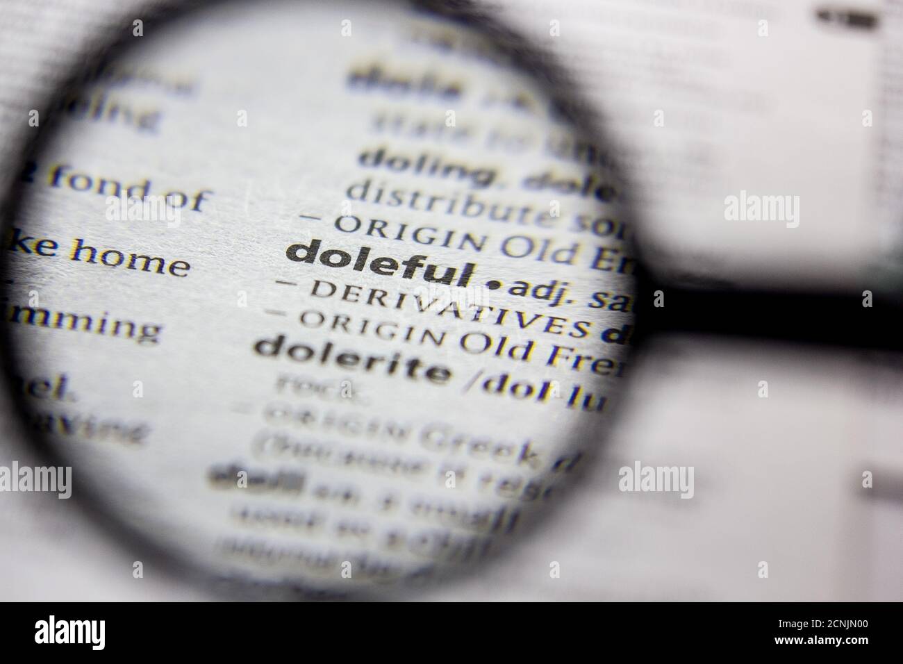 Word or phrase Doleful in a dictionary Stock Photo - Alamy