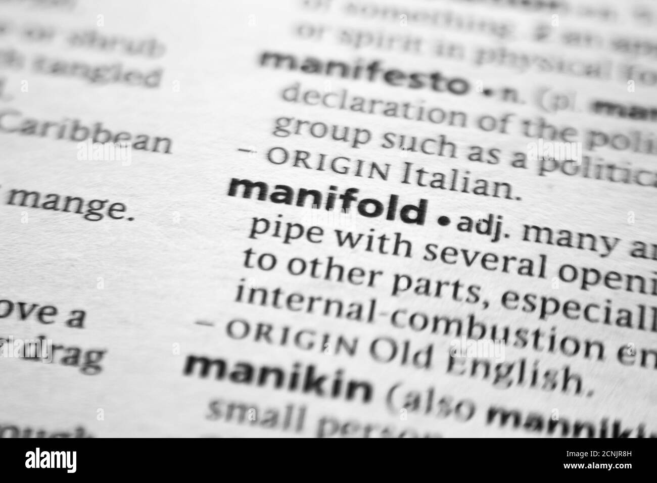Word or phrase Manifold in a dictionary Stock Photo - Alamy