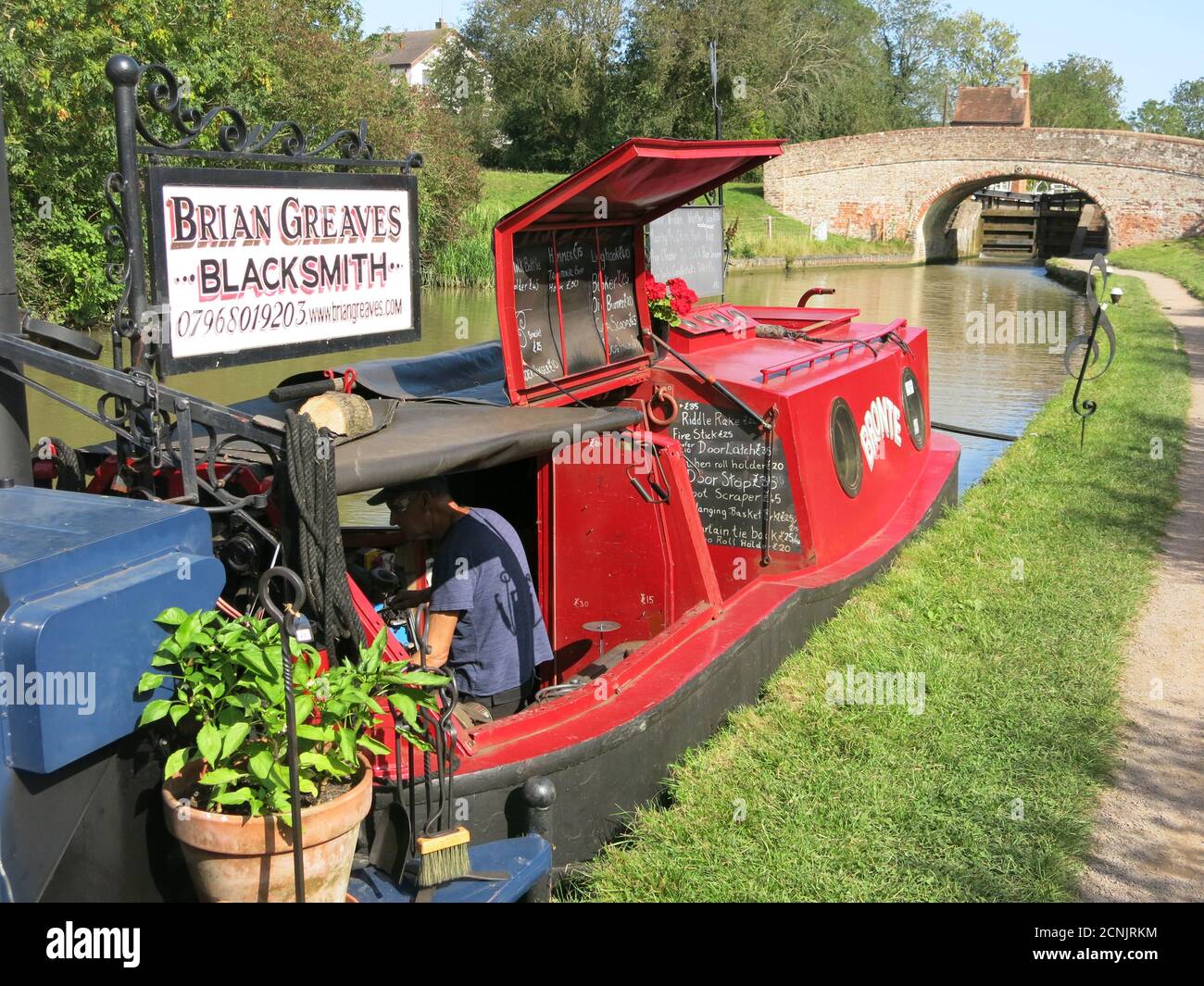 Traditional blacksmith, Brian Greaves, works on board his narrowboat on ...