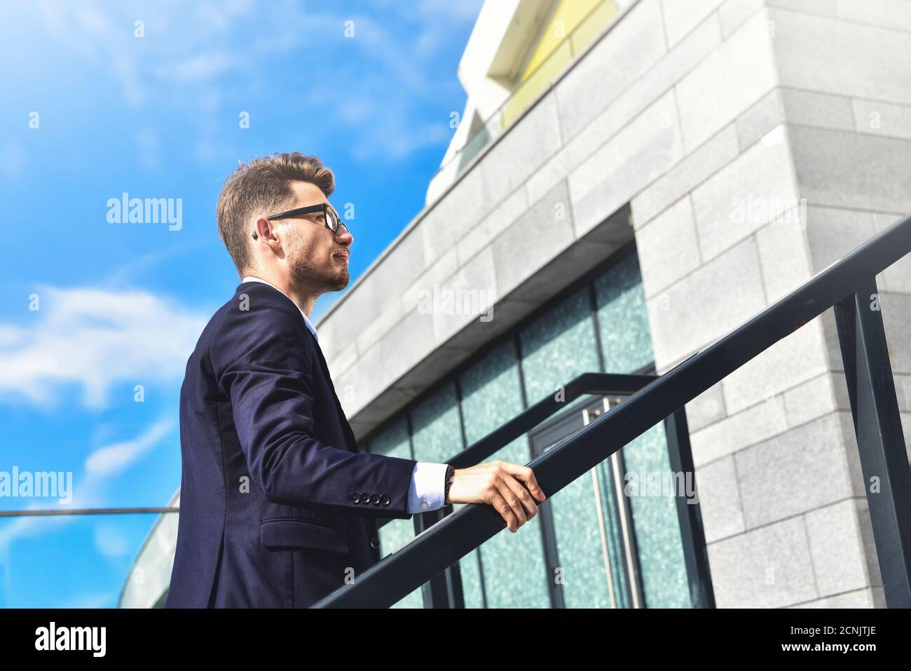 Man going upstairs hi-res stock photography and images - Alamy