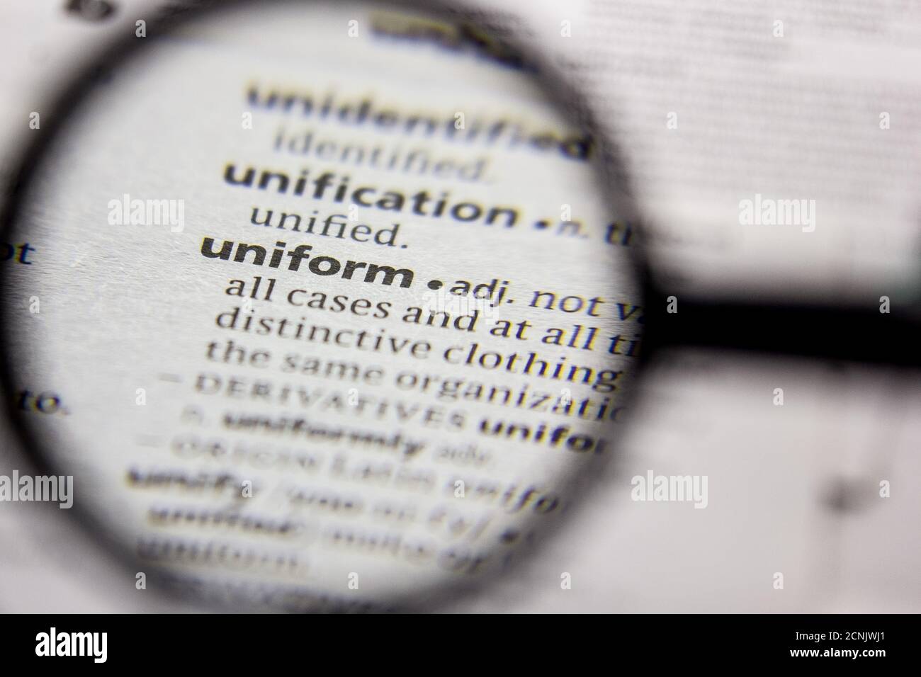 Word or phrase Uniform in a dictionary Stock Photo - Alamy