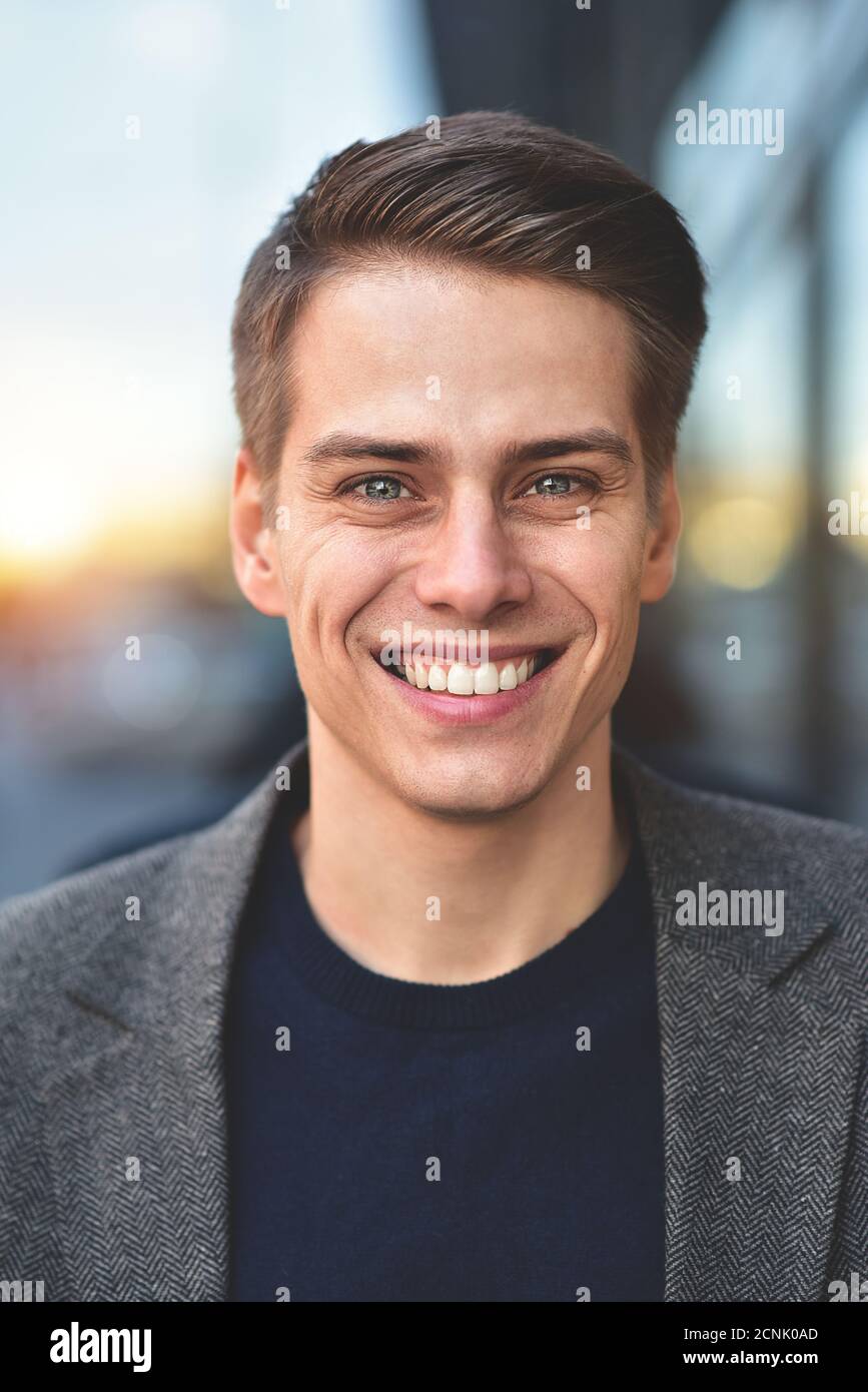 Portrait happy man standing outdoors hi-res stock photography and ...