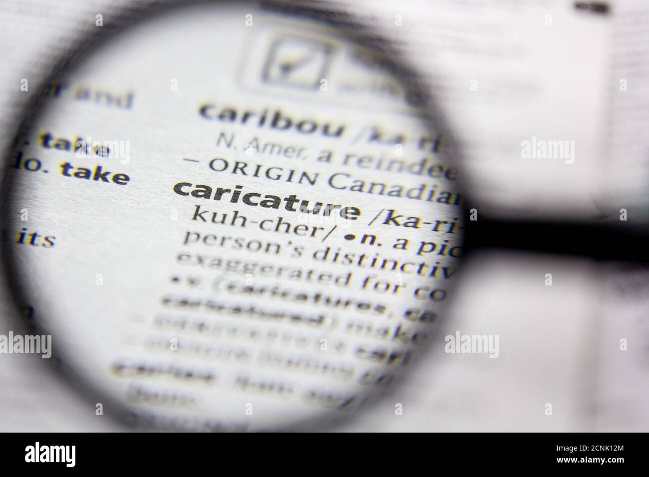 Word or phrase Caricature in a dictionary Stock Photo - Alamy