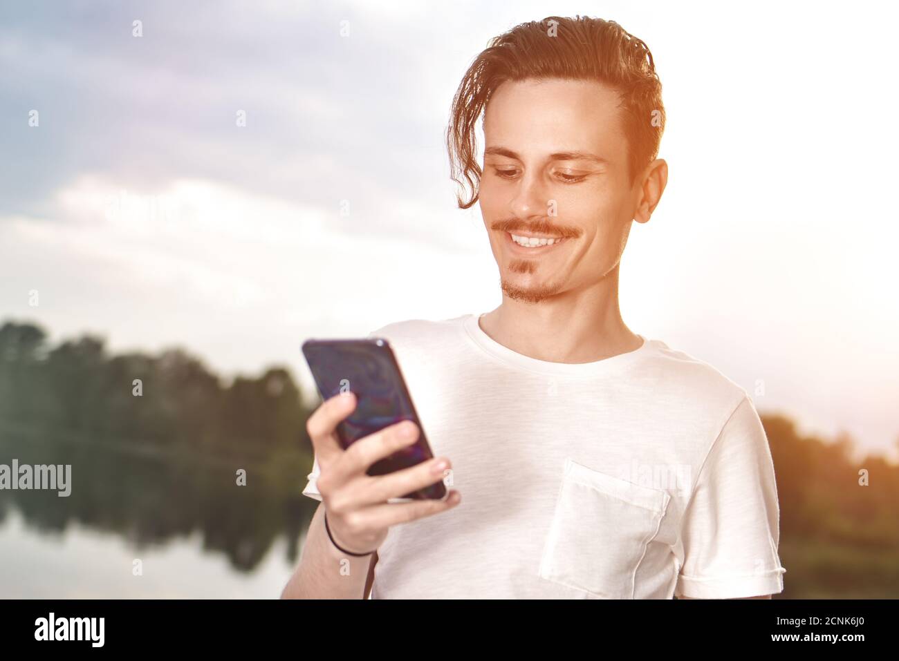 Phone walking beach hi-res stock photography and images - Alamy