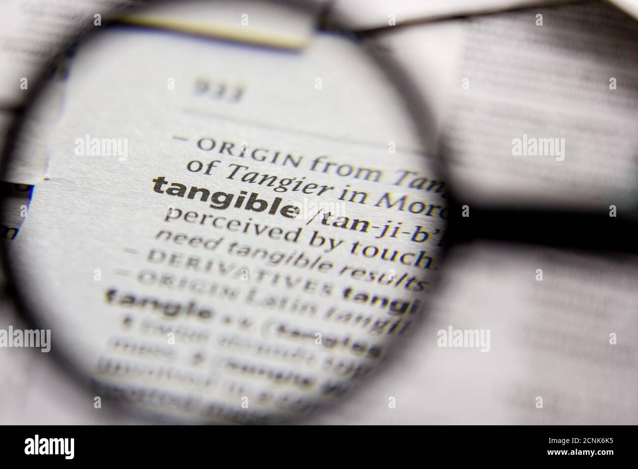 Word or phrase Tangible in a dictionary Stock Photo - Alamy